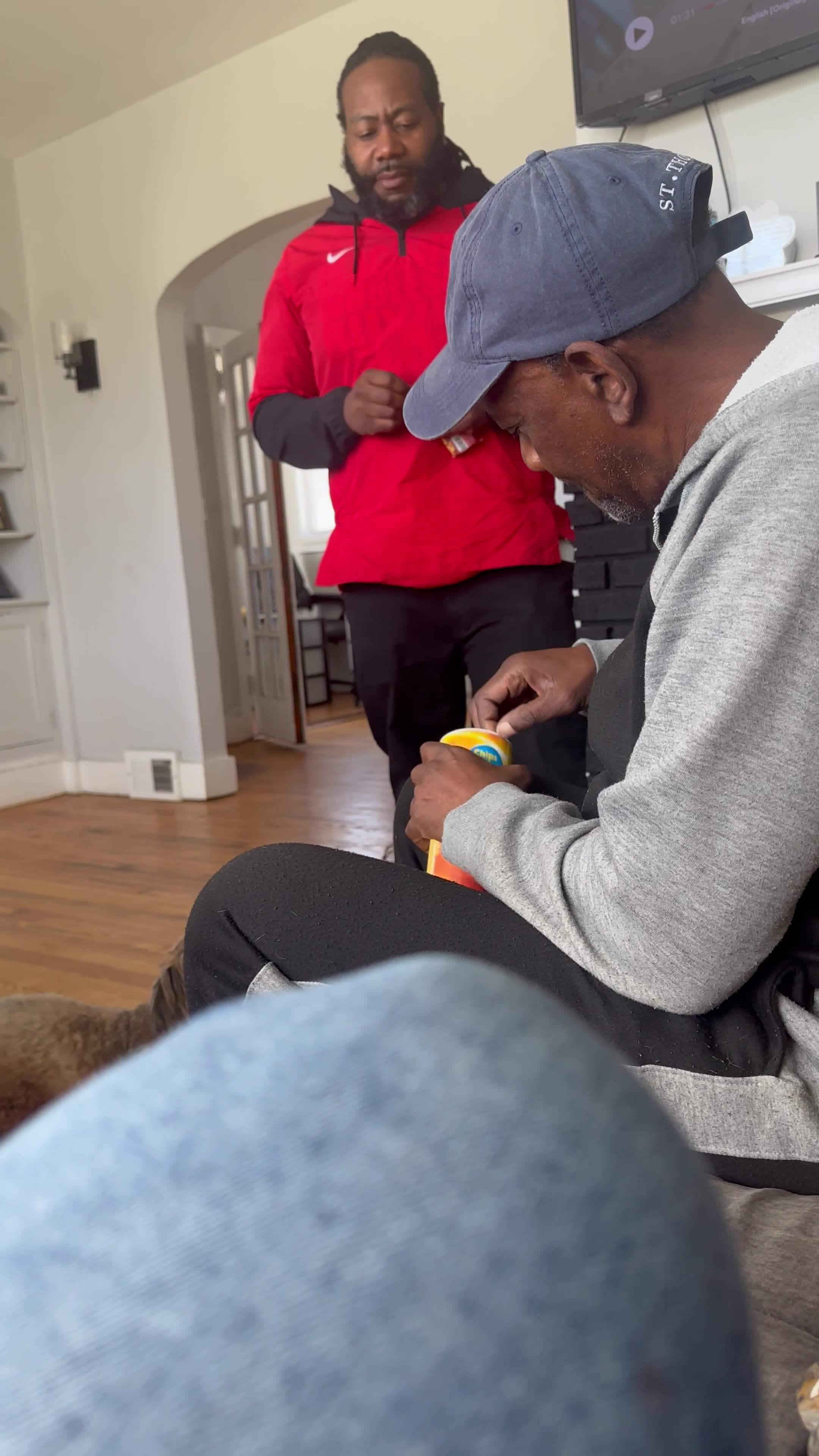 Grandpa Startled By Spring-Loaded Snake in a Can