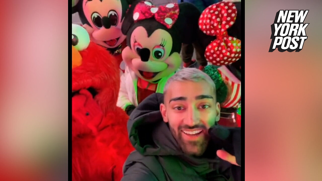 Tourist chased away by furious Times Square characters for exposing ...