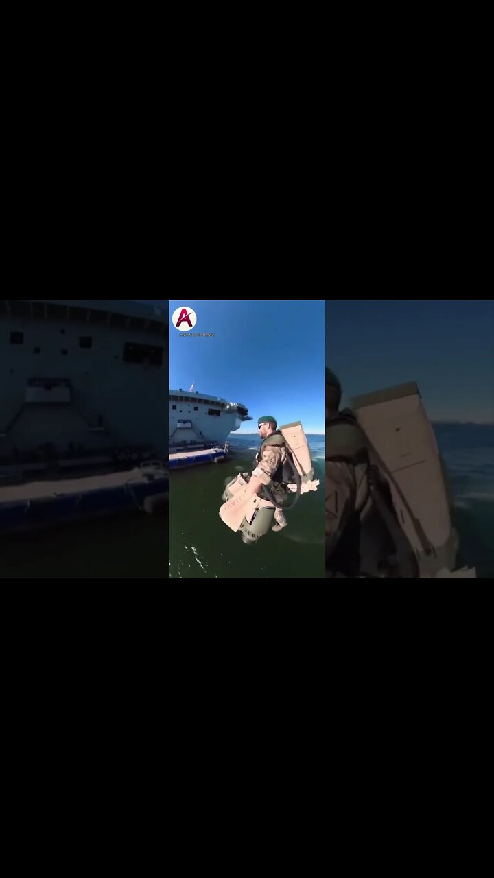 ‘Iron Men’ make jet suit entrance onto HMS Queen Elizabeth