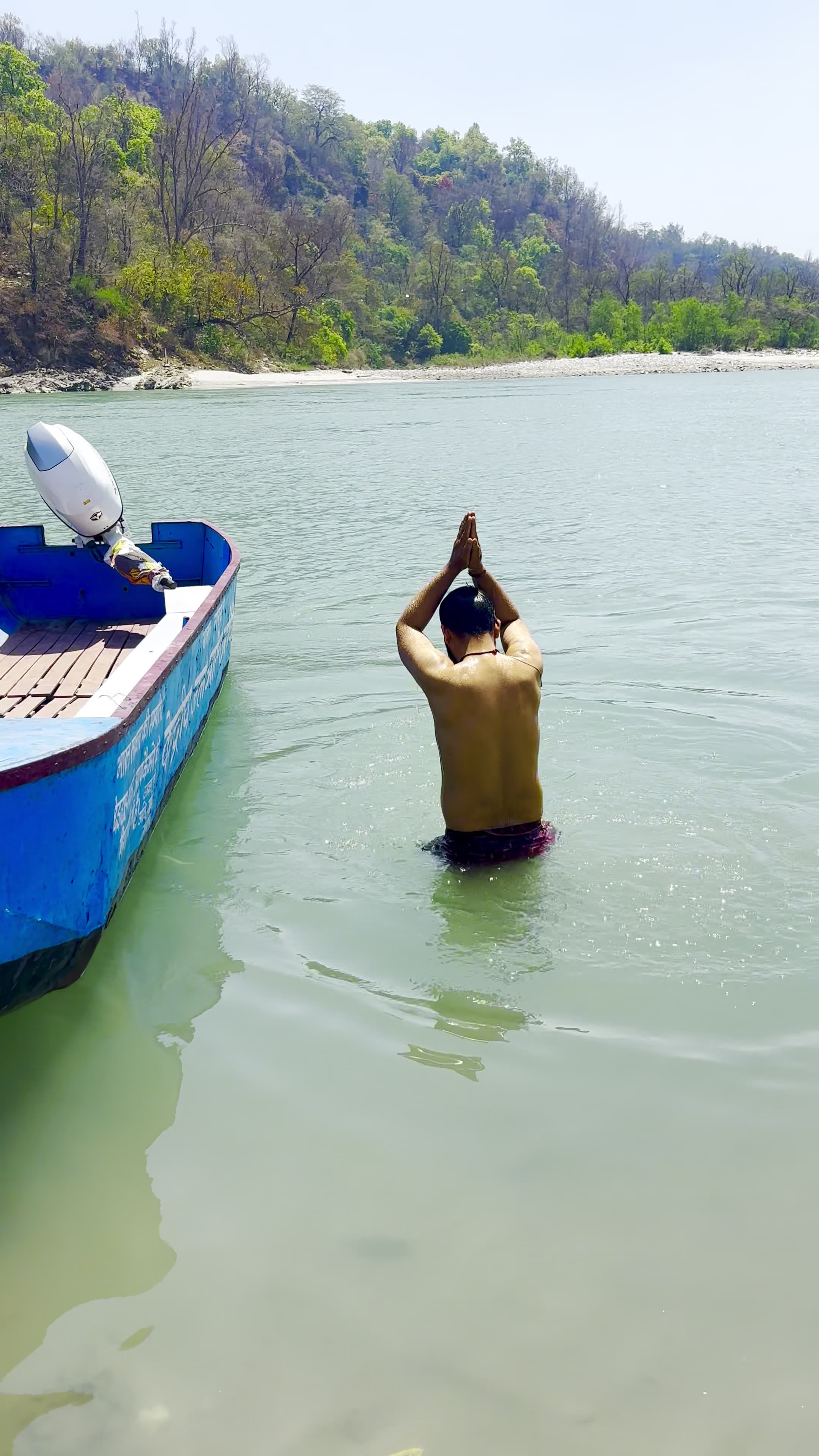 Taking a morning dip in the Ganga in Rishikesh India