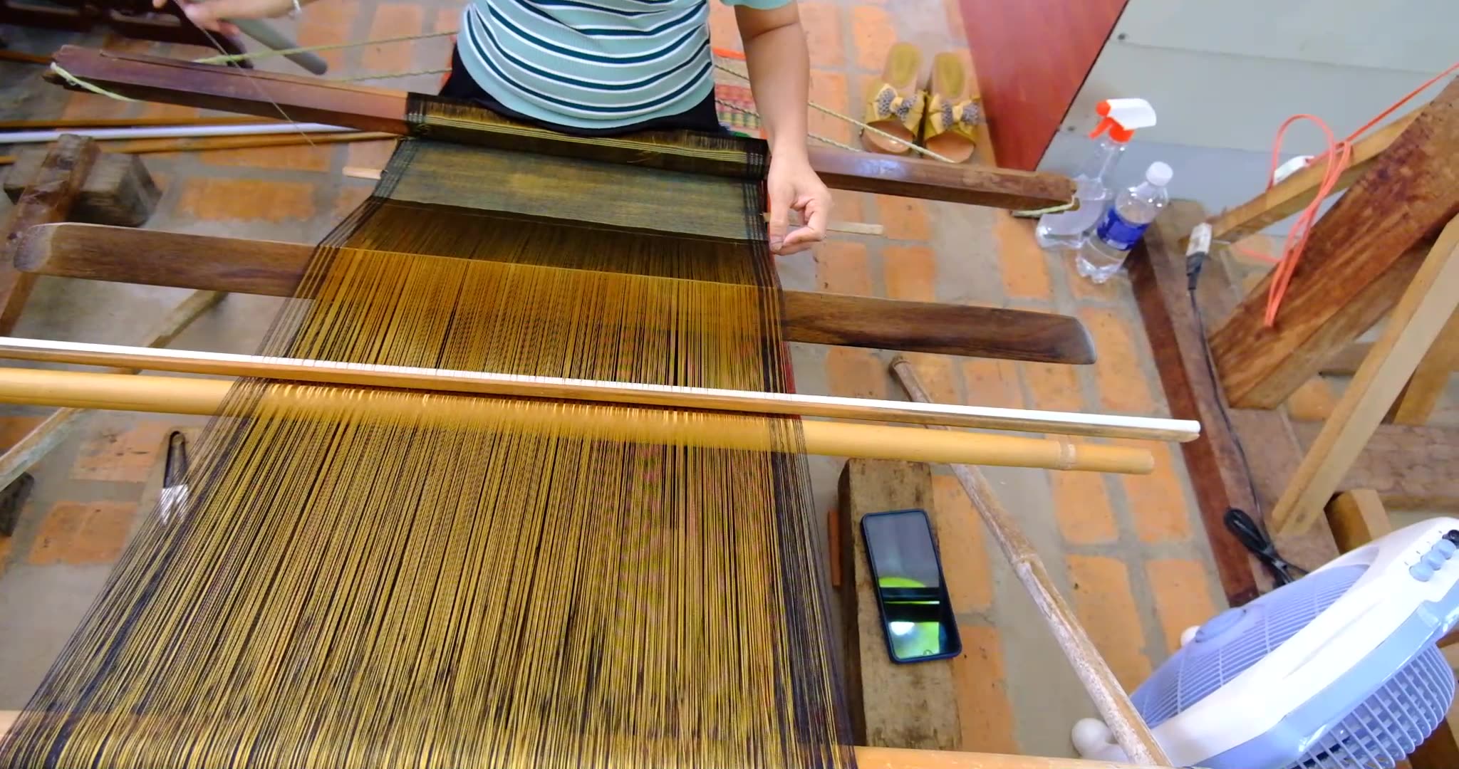 Cham people weave cloth