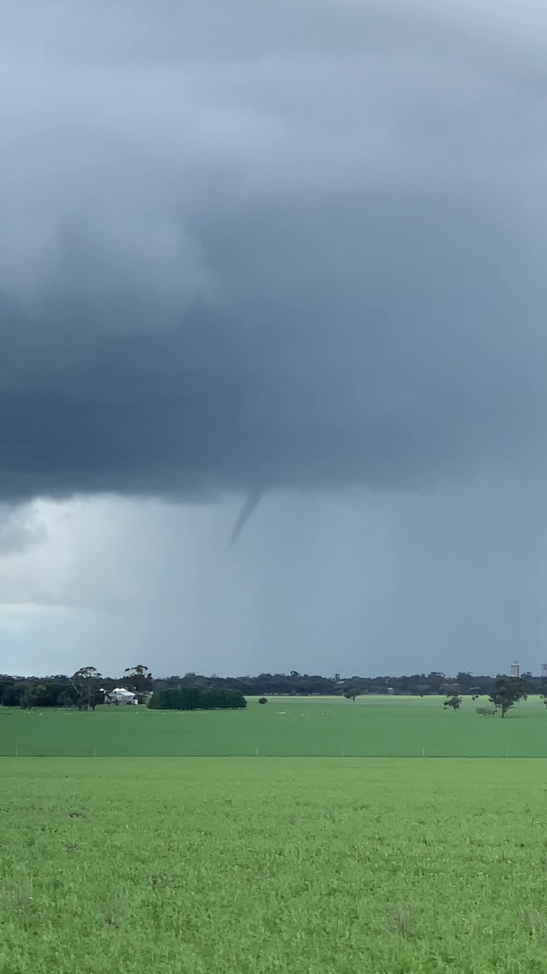 Funnel Forms Above Farmer's Crops