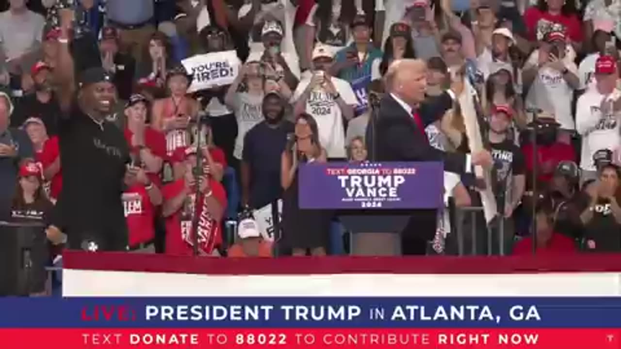 Trump invited a local Atlanta artist onstage who created the 'Fight ...