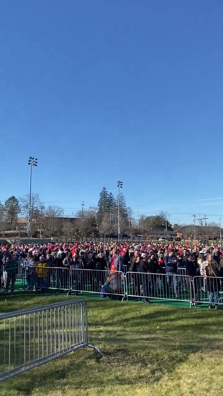 An enthusiastic crowd chants ahead of President Donald Trump’s rally