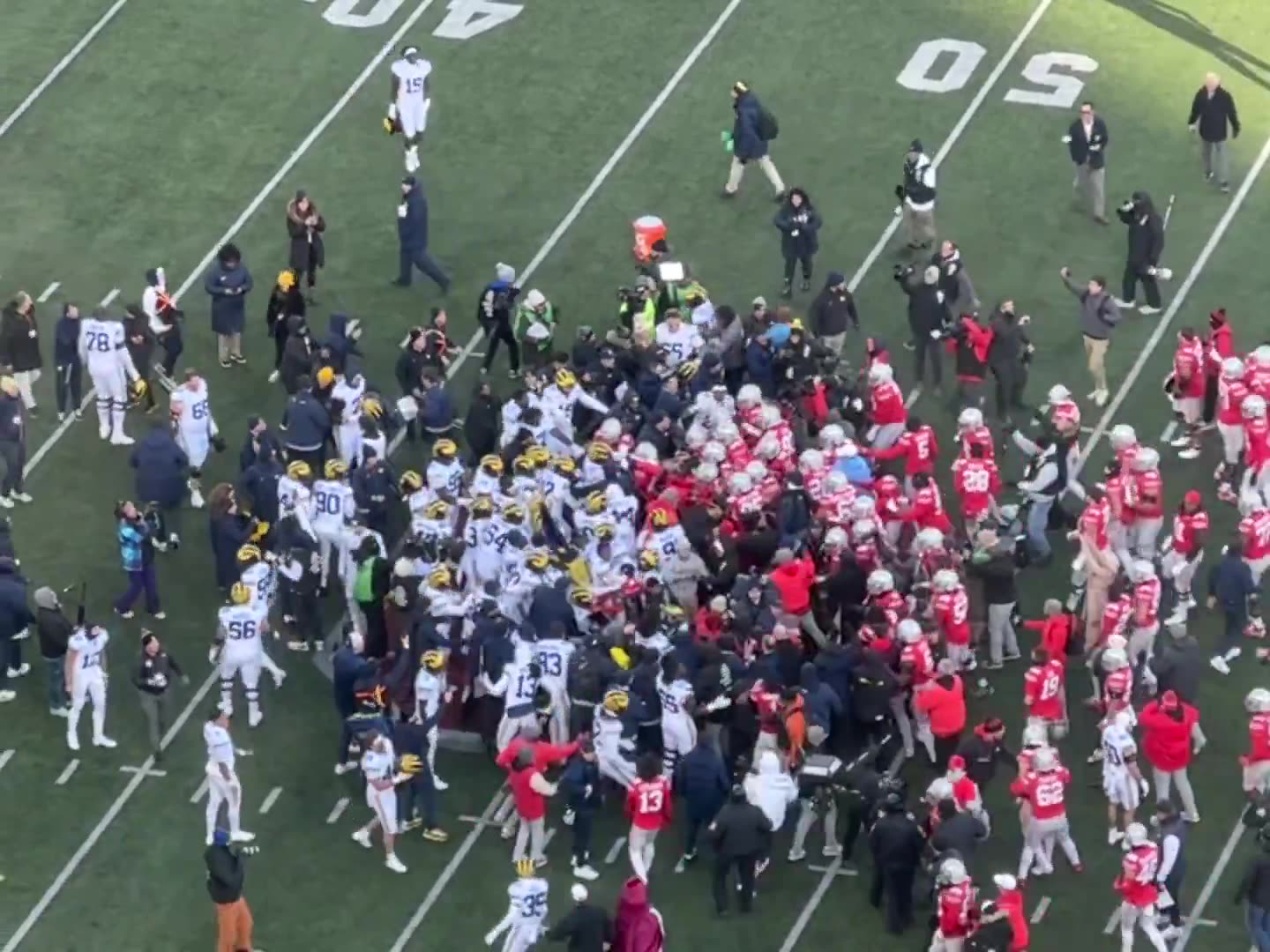 All hell breaks loose after Michigan tried to plant flag midfield at ...