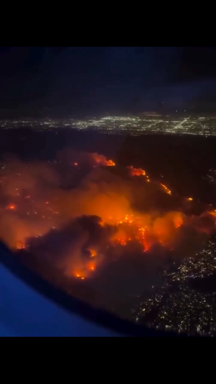 An aerial view of the fire raging out of control in Los Angeles County ...
