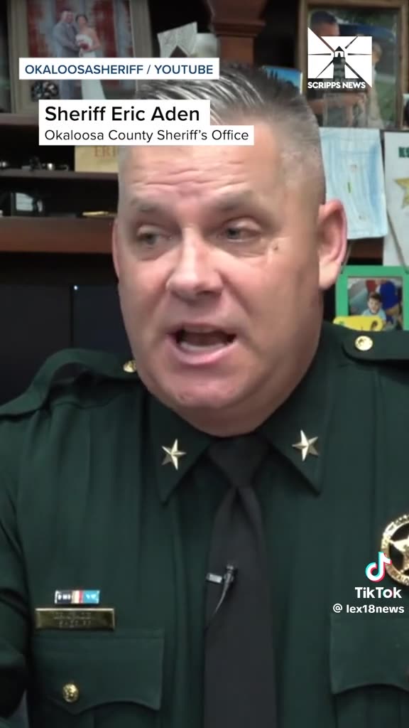 Body cam footage of an officer spooked by acorn hitting the back of his car