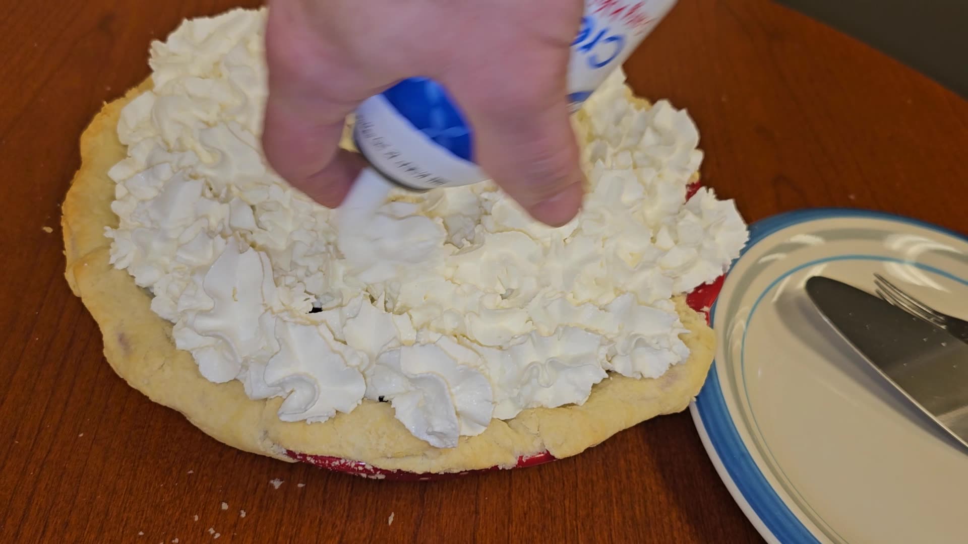 Adding the canned Ready Whipped Cream Topping & Slicing the First Piece!