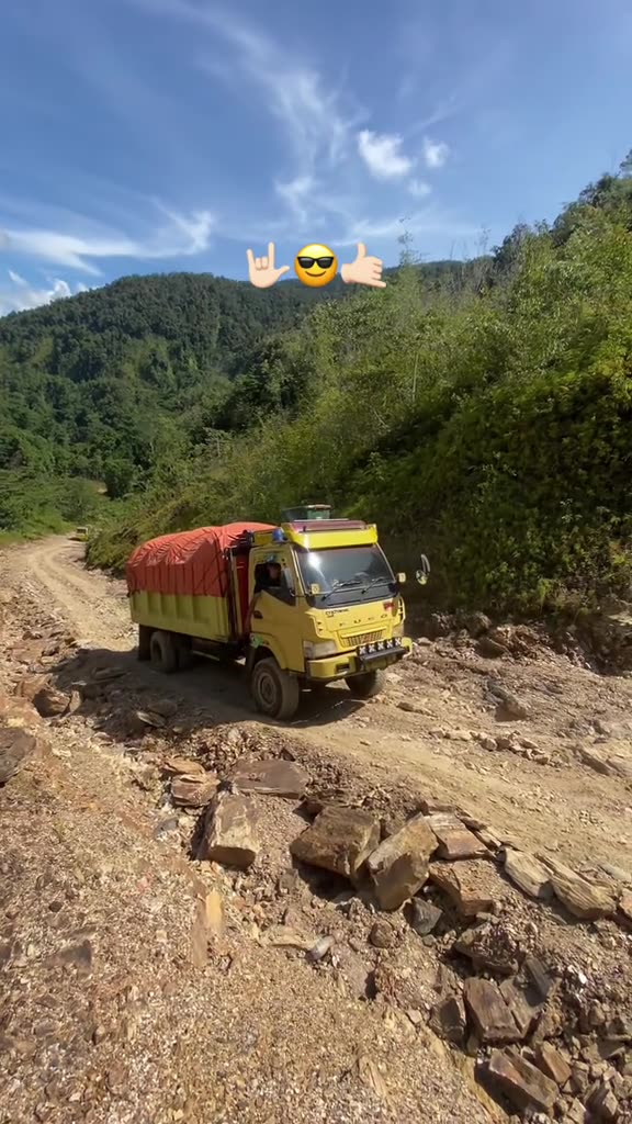 the action of a young driver over a steep, sharp incline