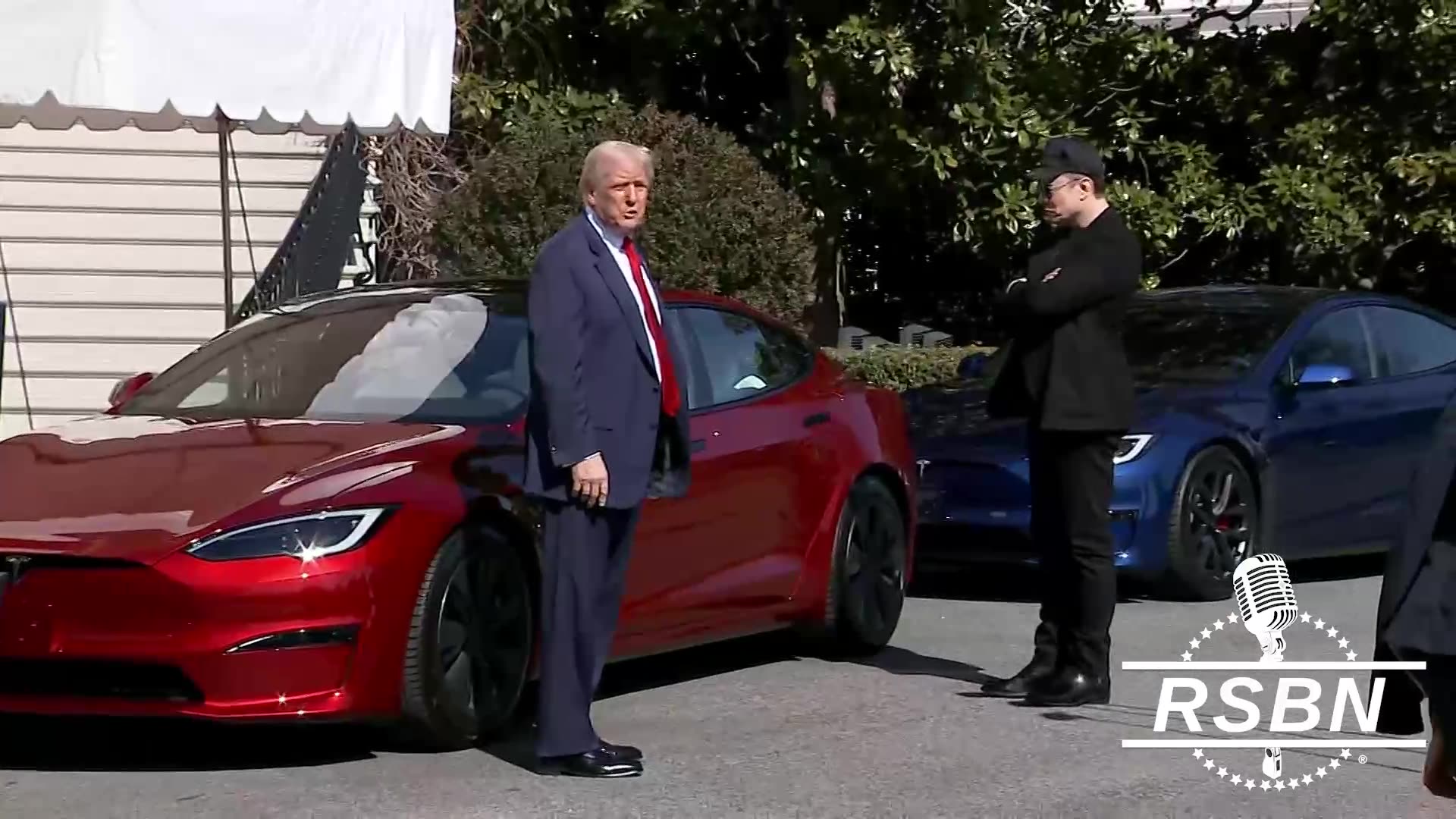 WATCH: President Trump Buys a Tesla from Elon Musk at the White House ...