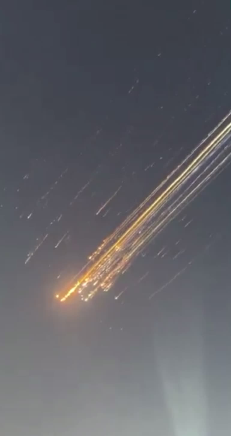 What looks like shooting stars in the sky is actually a starship that ...