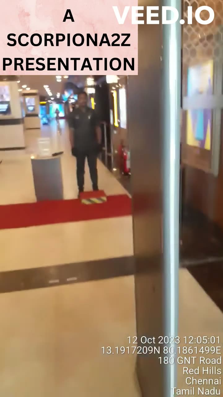 entering the checking and frisking area of theatre...