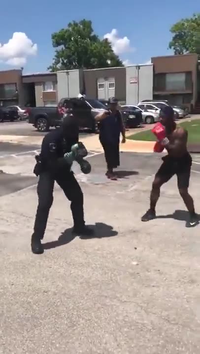 Cop vs man street boxing.