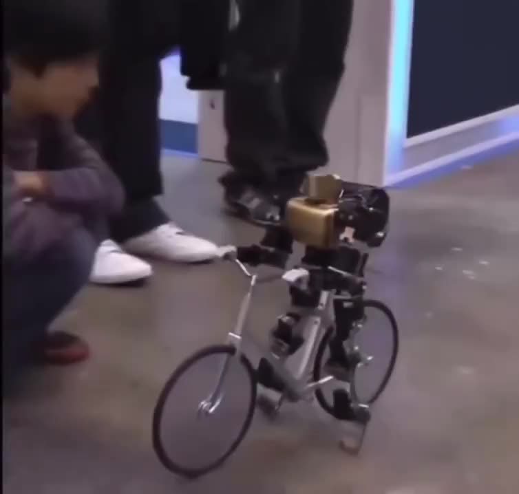 Robot Riding A Bike