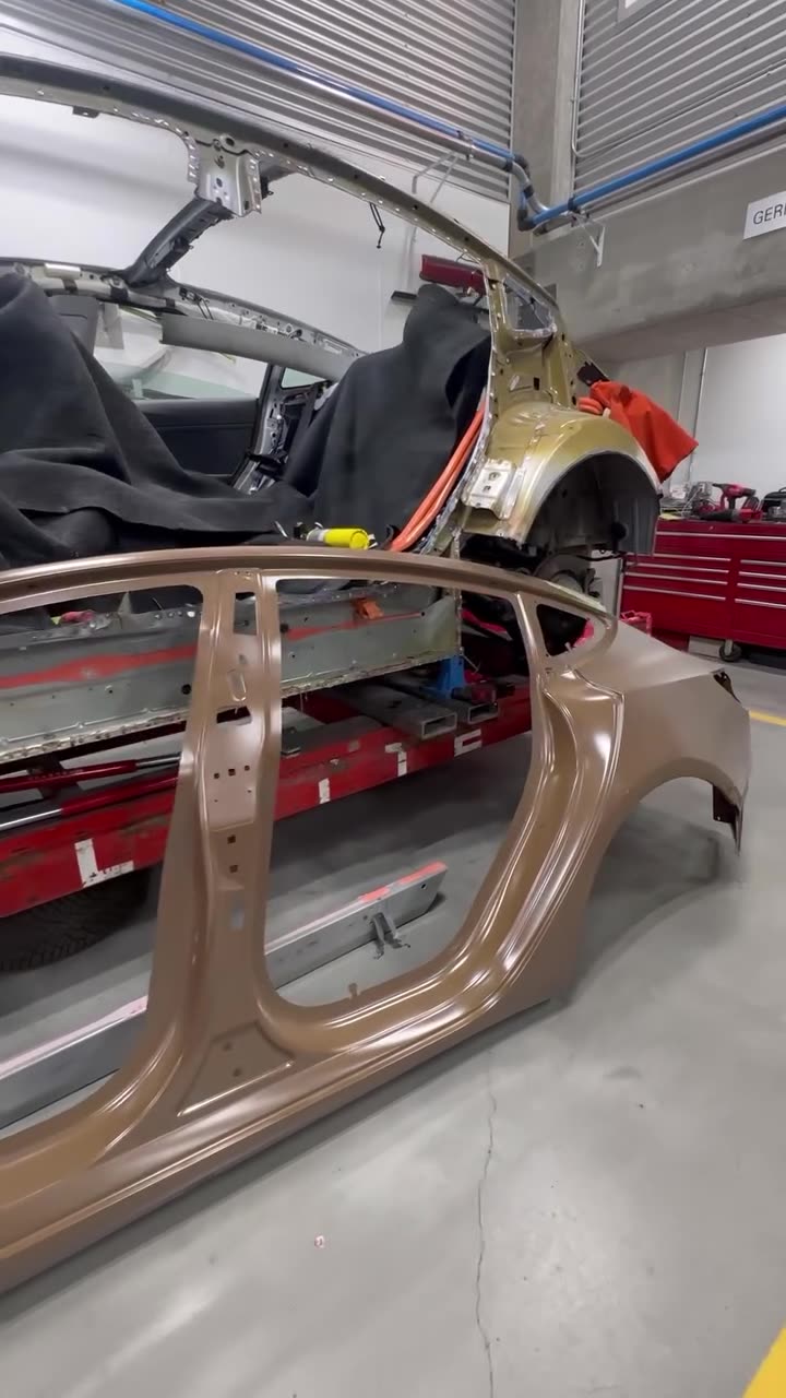 Big job in progress on a Tesla Model 3 on a Celette Sevenne frame machine