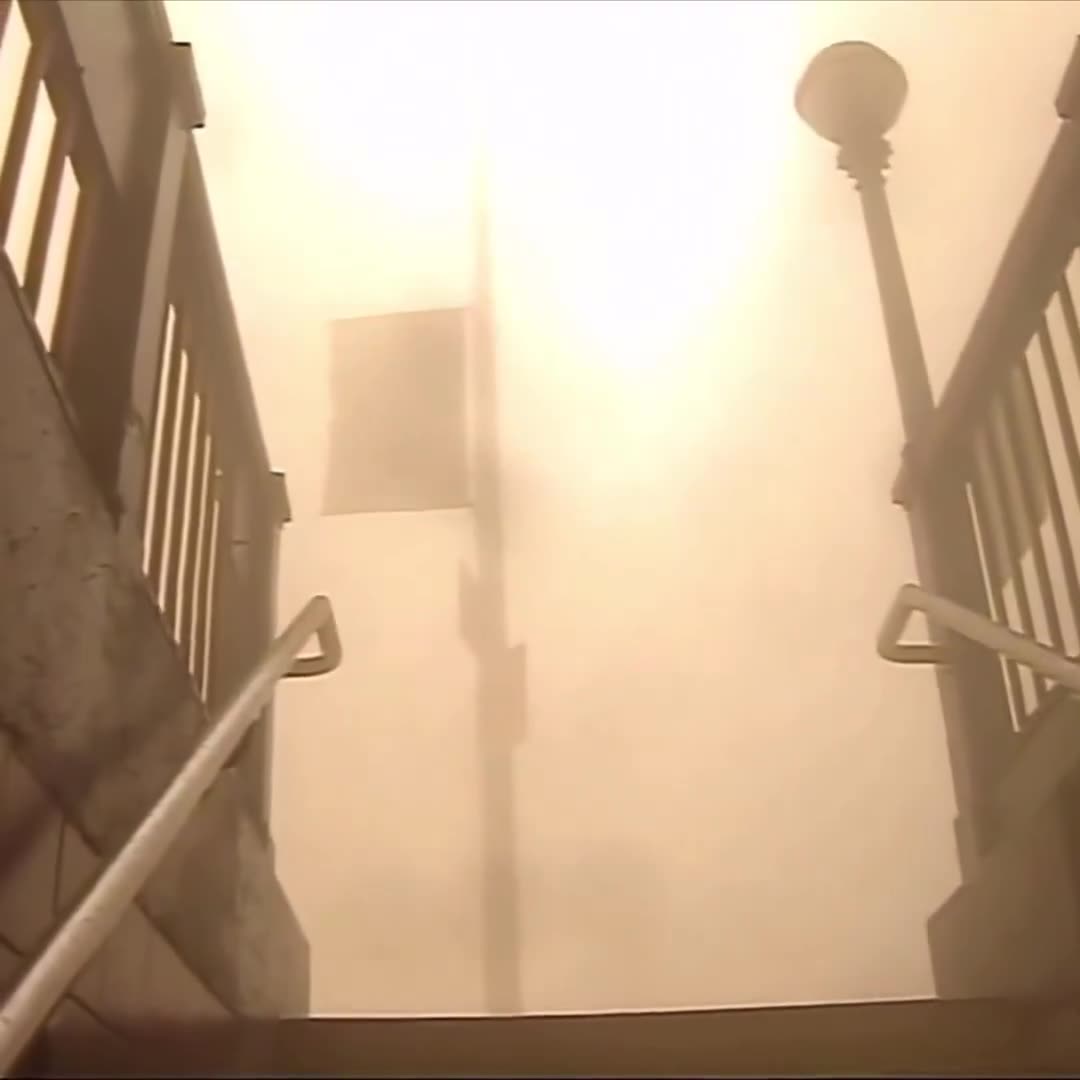 A cameraman hides in a NYC subway stairwell as the North Tower ...