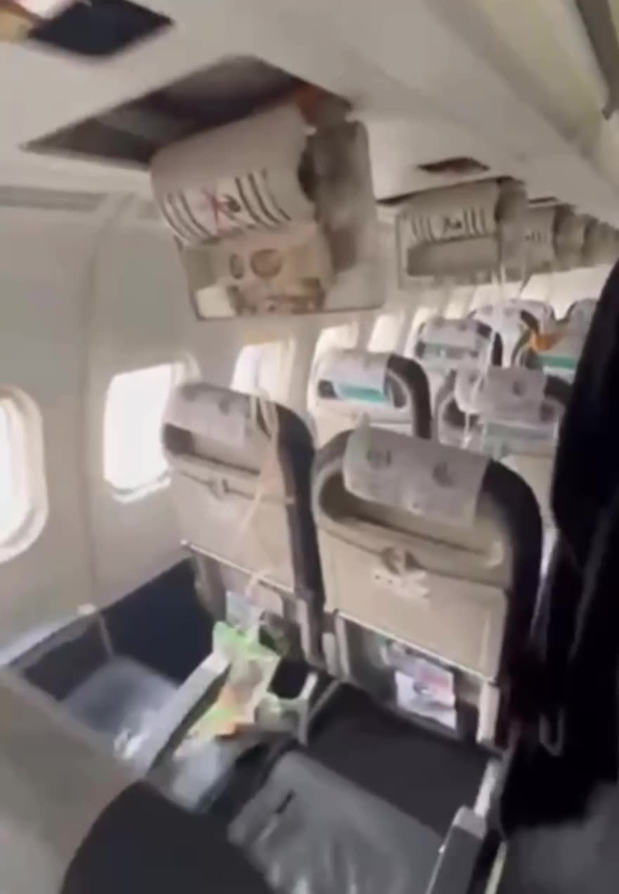 Passengers of Iranian plane after engine failure and emergency landing