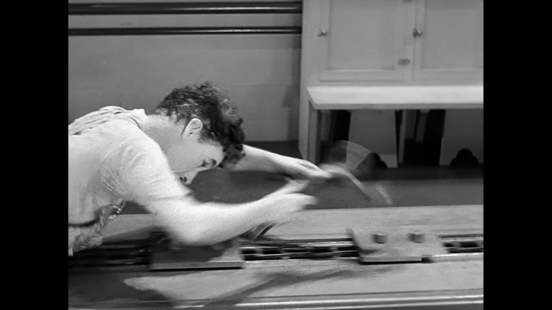 Charlie_Chaplin_Swallowed_by_a_Factory_Machine_-_Modern_Times__