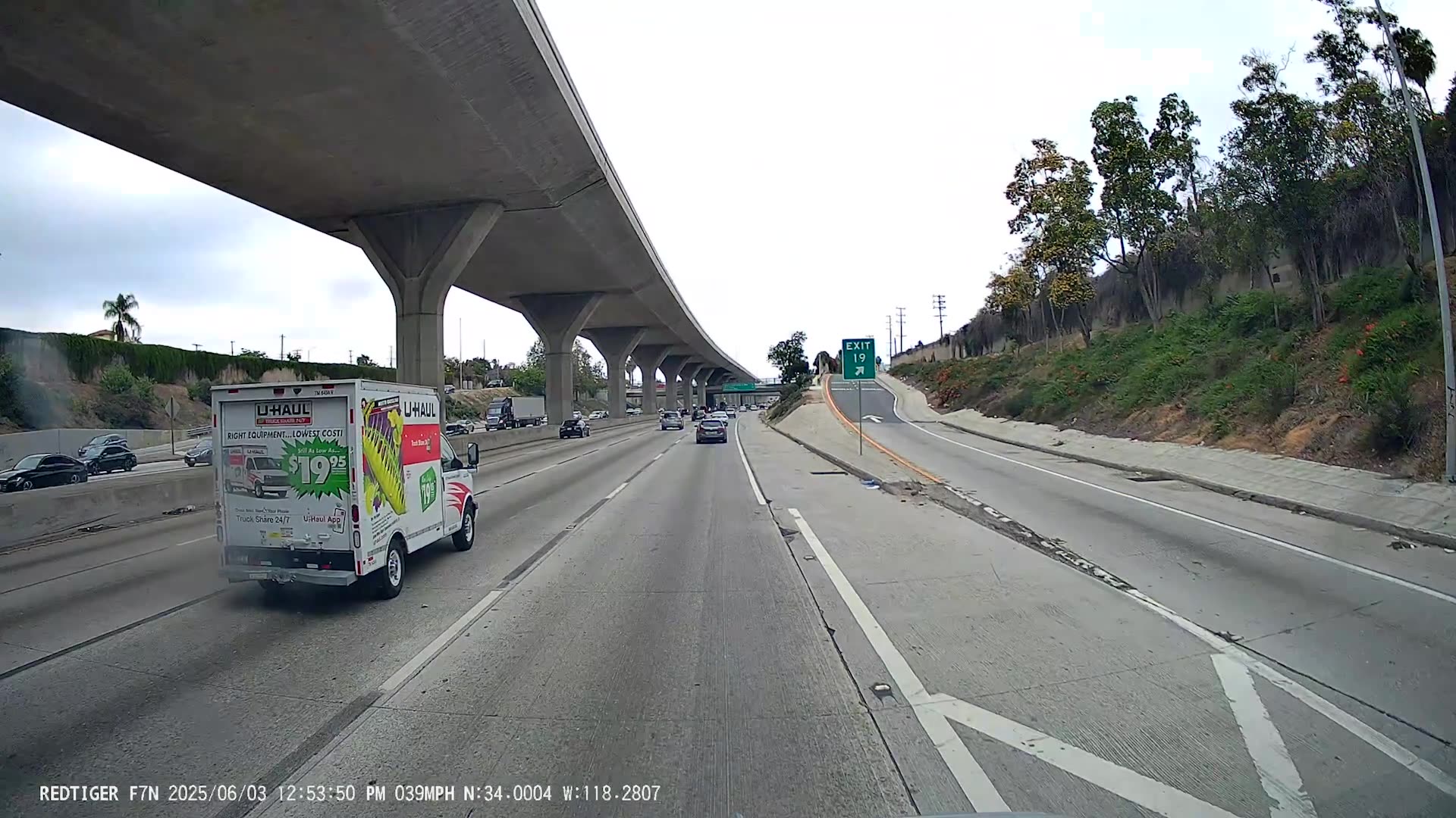 Person Throws a Large Rock on the Freeway
