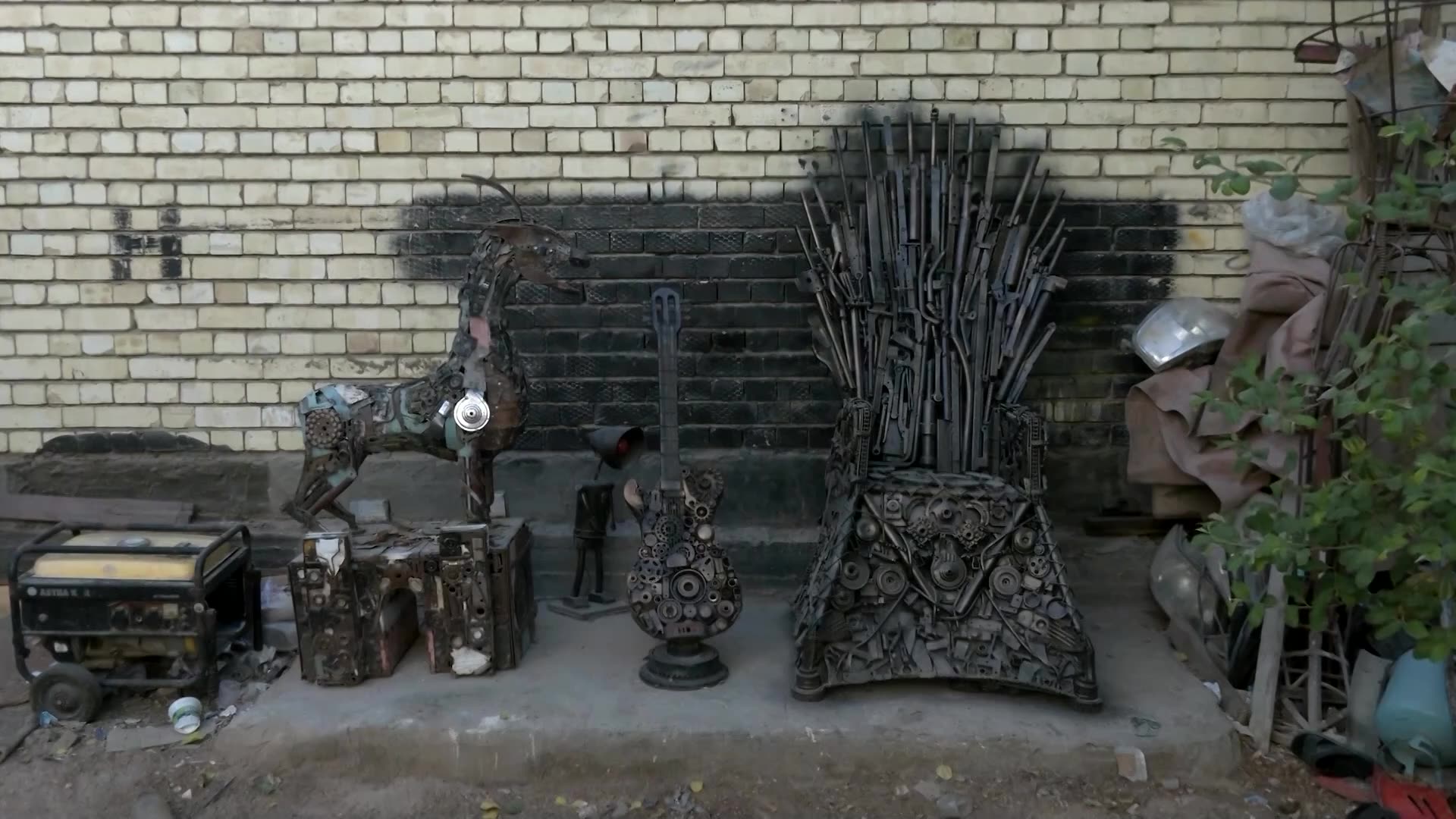 Iraqi mechanic turns auto scrap into art to reduce waste