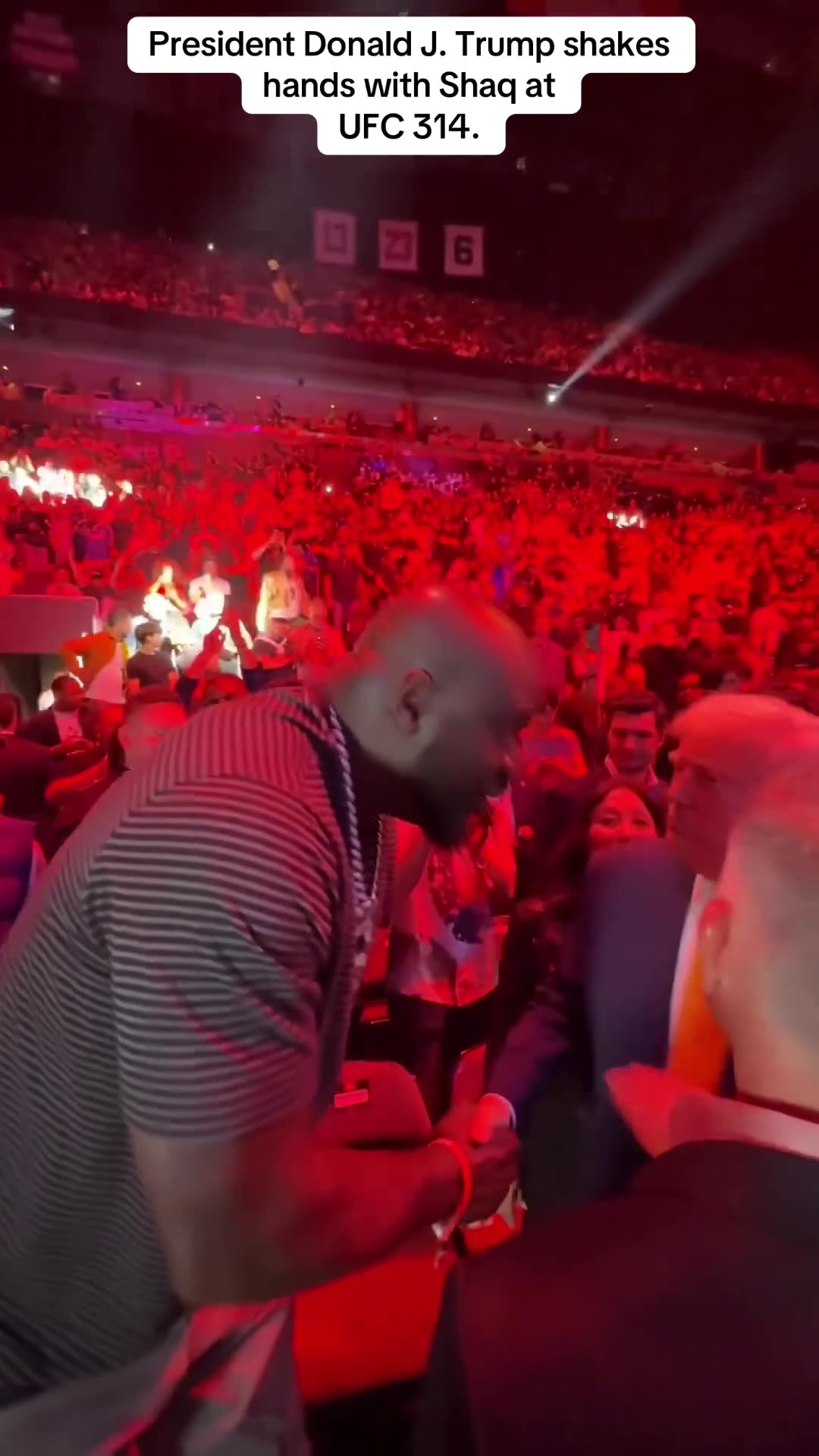 President Donald J. Trump shakes hands with Shaq at UFC 314.