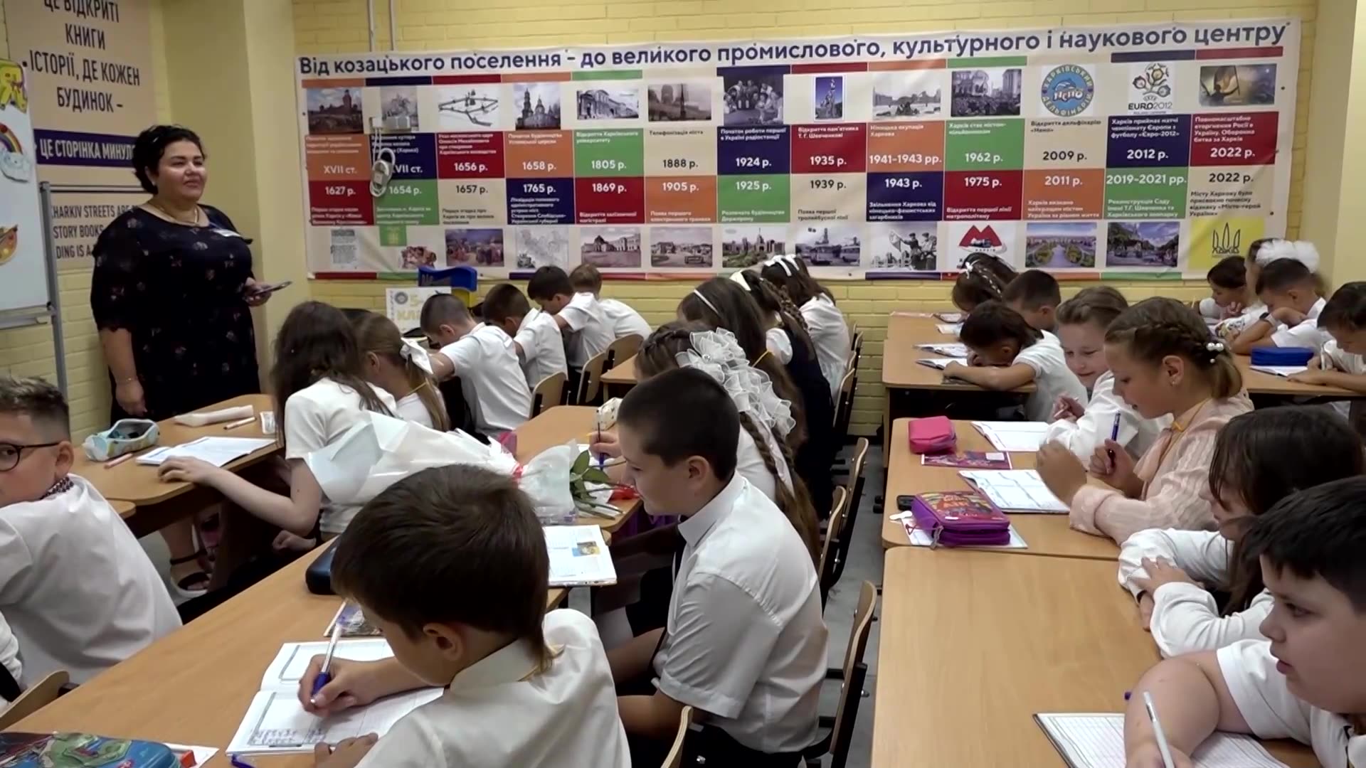 Children in Kharkiv return to school in underground classrooms