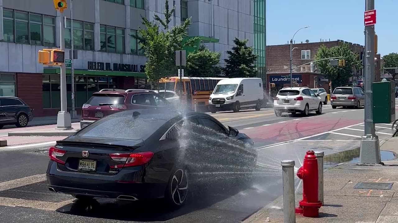 Malfunctioning Fire Hydrant Used As Free Car Wash