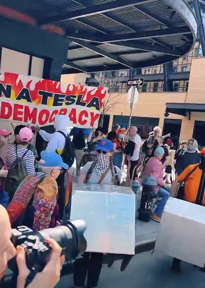 Tesla 'Protesters' Are Inciting Violence With Large Banner Calling to ...