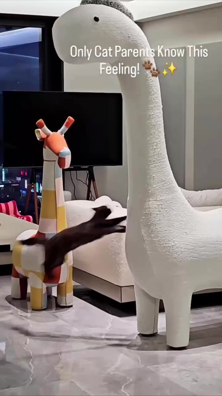 Dinosaur scratch post for the cats