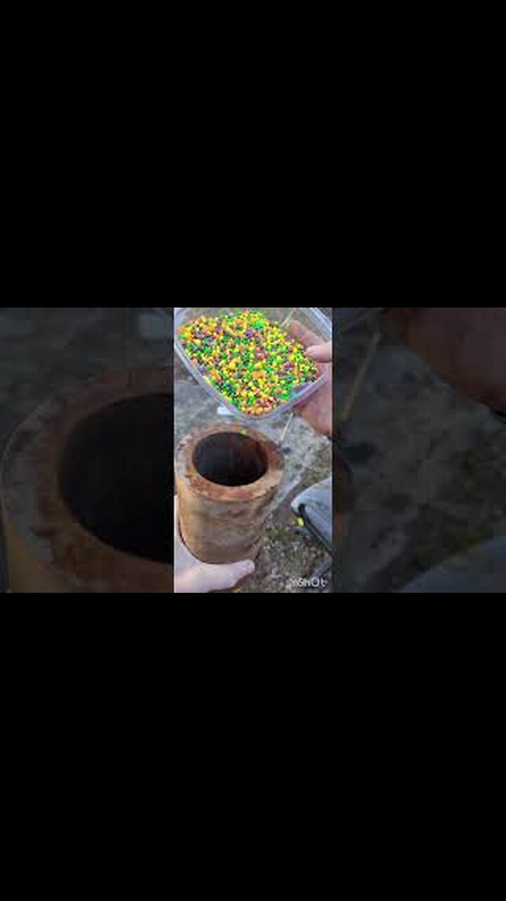 FIRING A 2LB Candy Cane Out of a black powder cannon through a washing ...