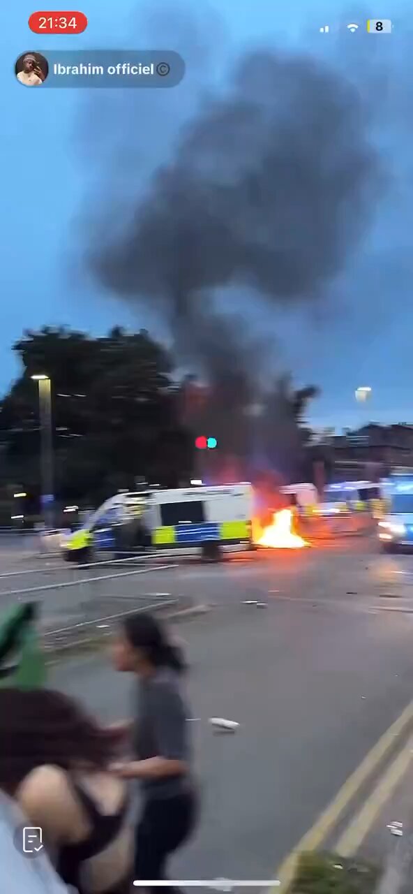 UK Leeds Riots: Rioters Torch Bus, Smash and Overturn Police Car with ...
