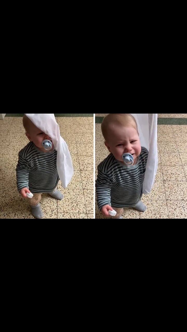 Dramatic baby cries when 'trapped' under bedsheet