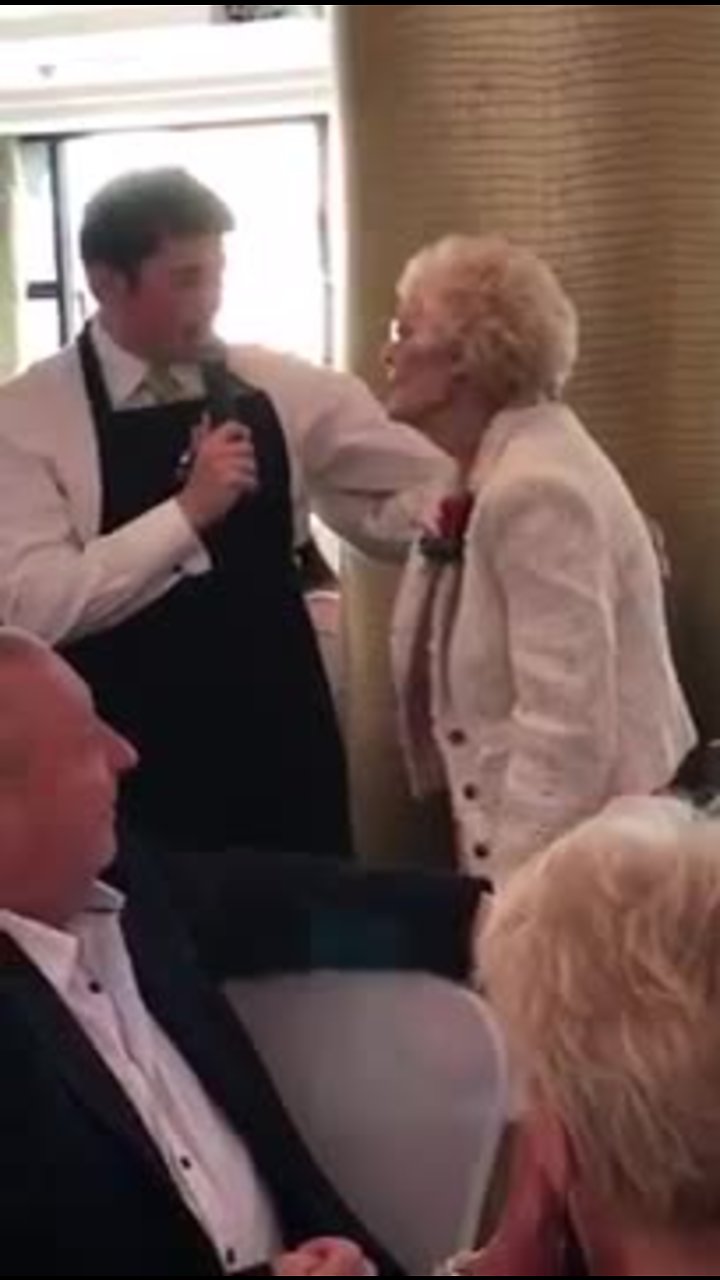 Singing waiter leaves guest in tears, gets standing ovation
