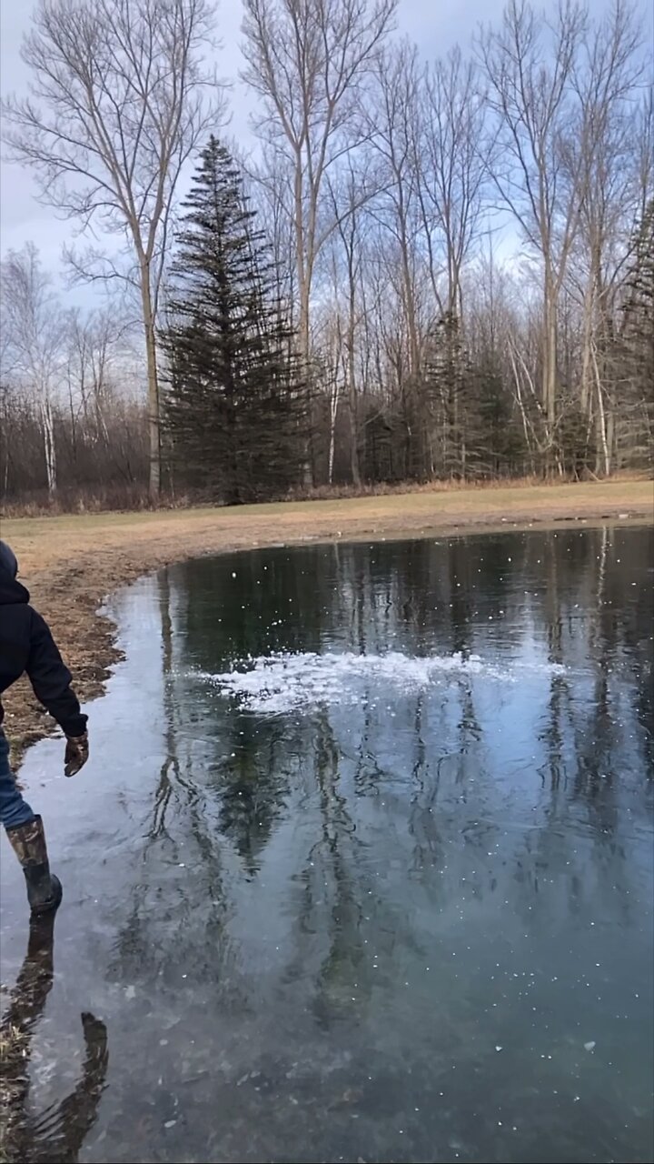 For the Boys! Throwing Ice on Frozen Pond!