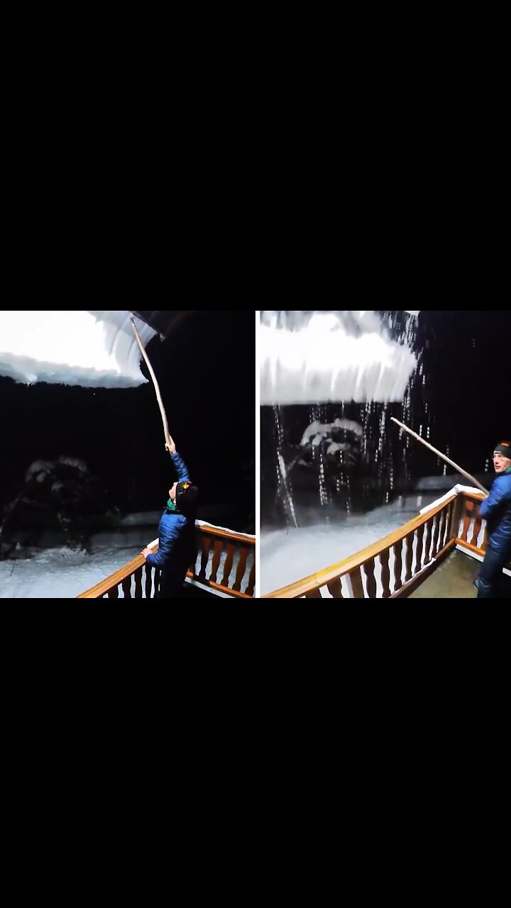 Avalanche of snow falls off mountain home