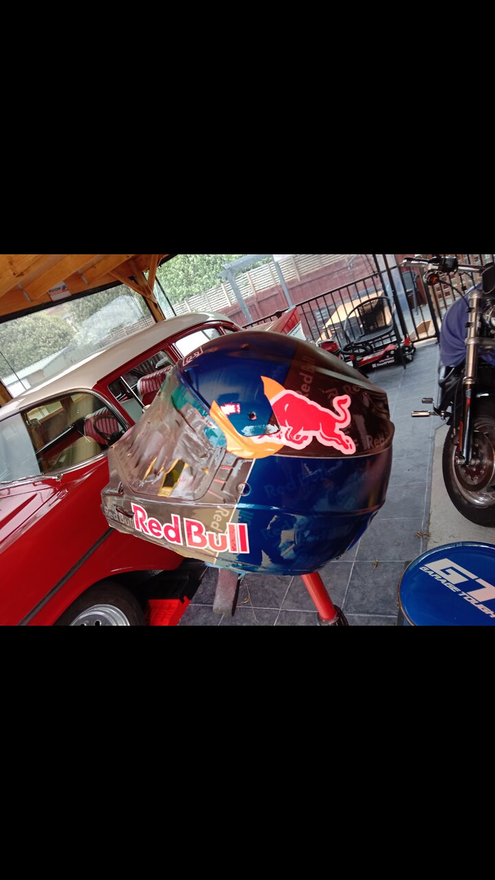 Custom painted red Bull helmet