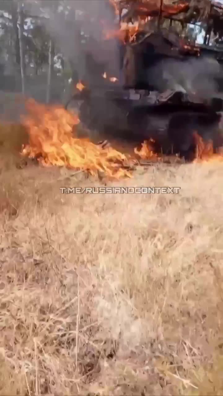 Russians Trying to Drive a Self-Propelled Heavy Gun Engulfed in Flames ...