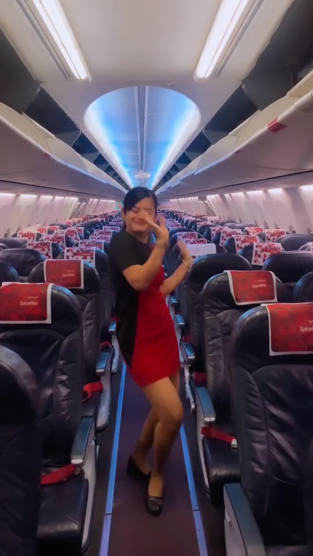 Flight Attendant dancing inside empty flight in amplifying mood!