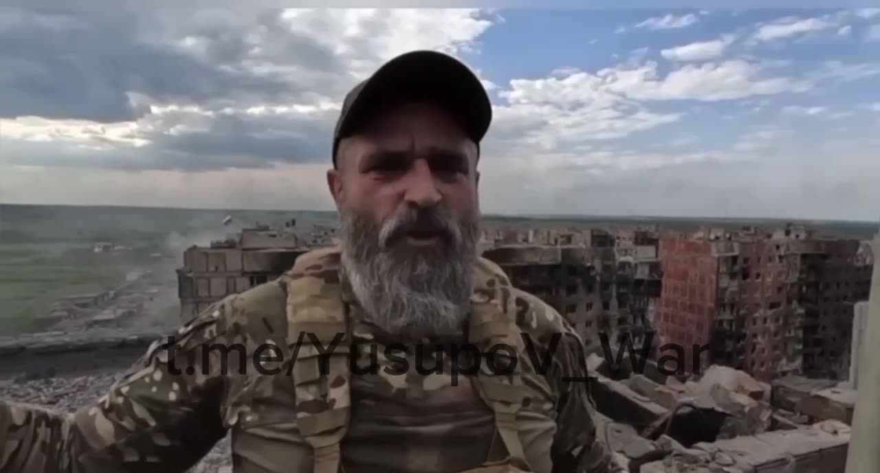 "Ratibor" hoisting the flags of the Russian Federation and PMC "Wagner"