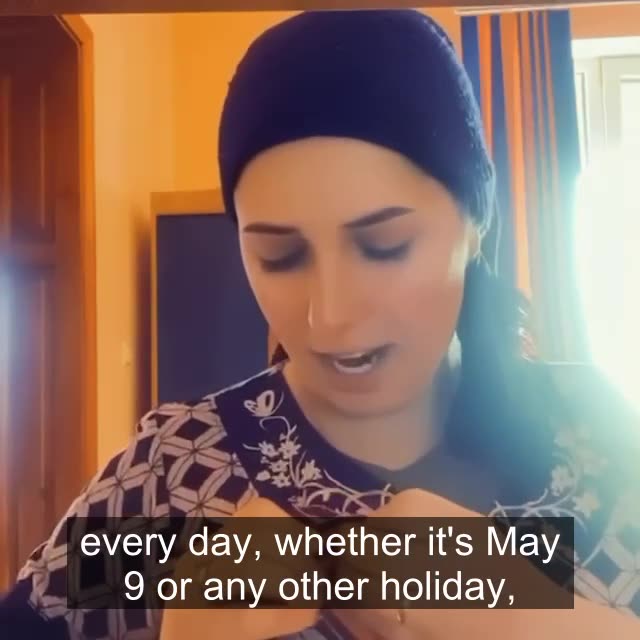 Moldovan woman gives short shrift to the banning of ribbon of Saint George.