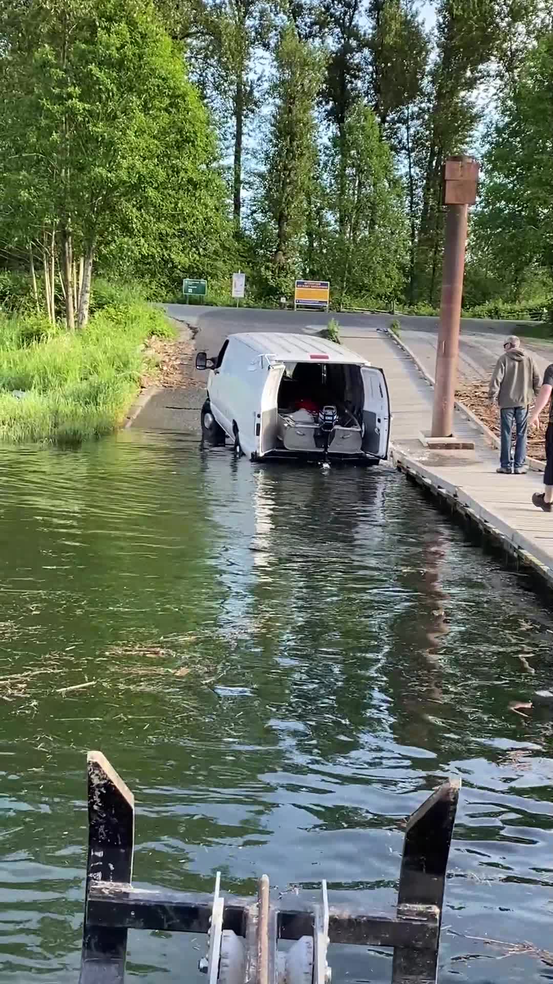 Guy at Boat Dock Loads Boat into His Van