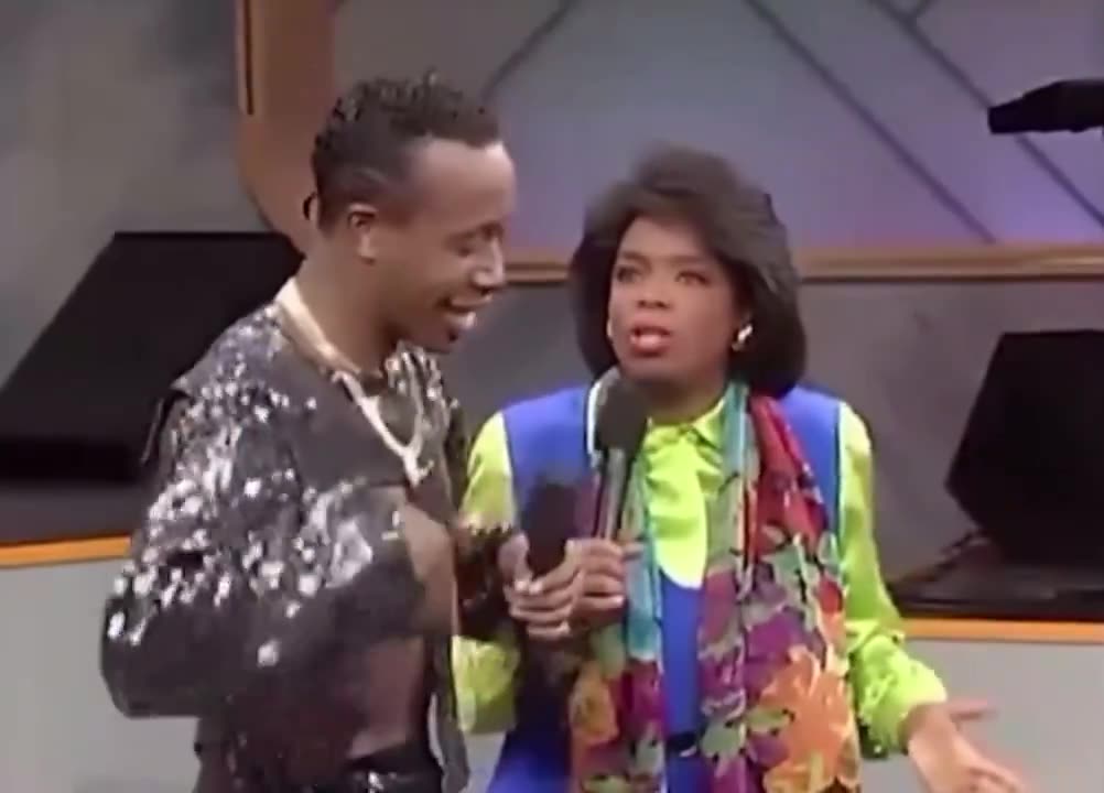 MC Hammer explains "Hammer Time" and shows Oprah how to do the dance (1990)