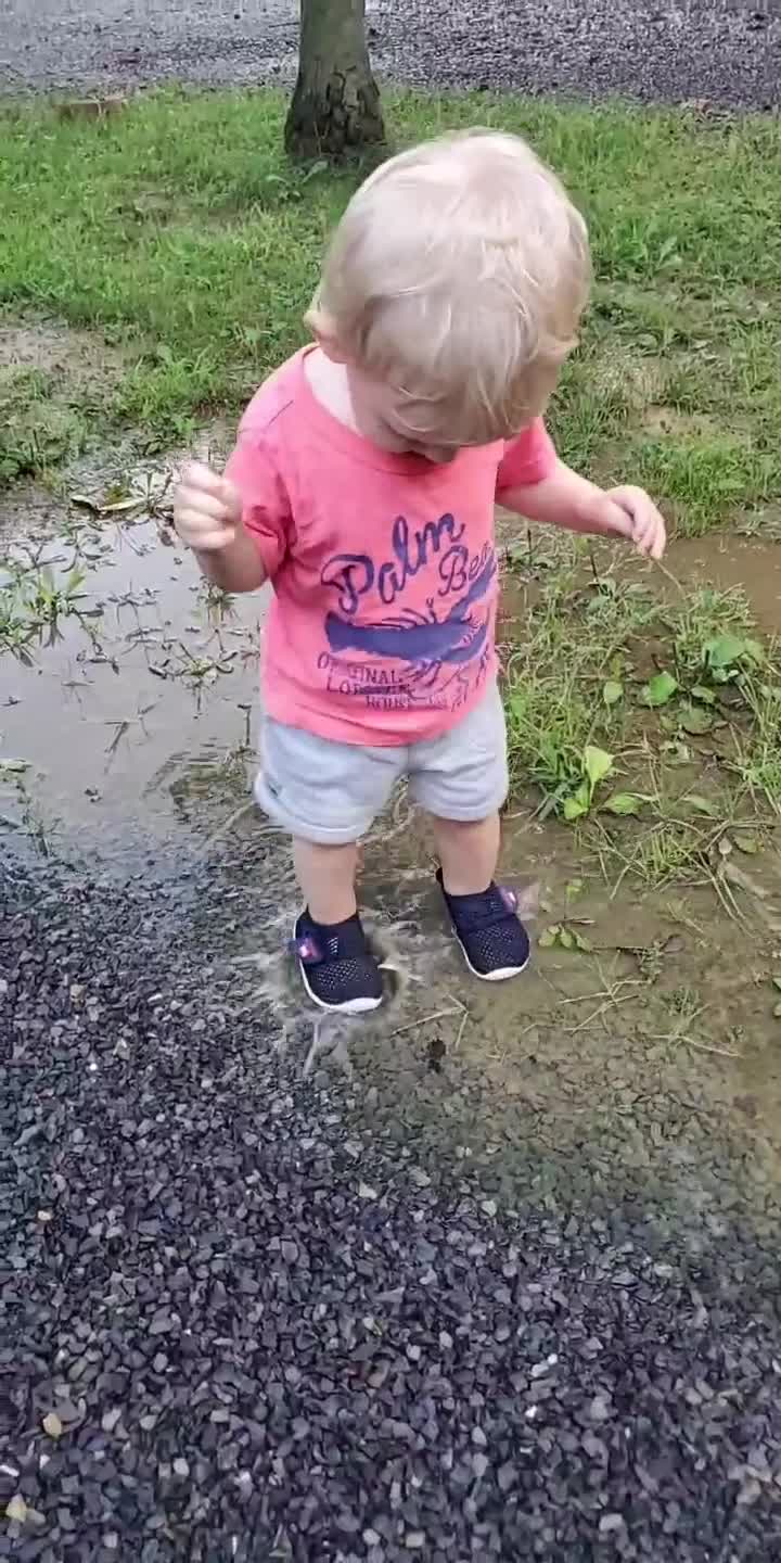 Perfect Puddle Soaks Playful Kid