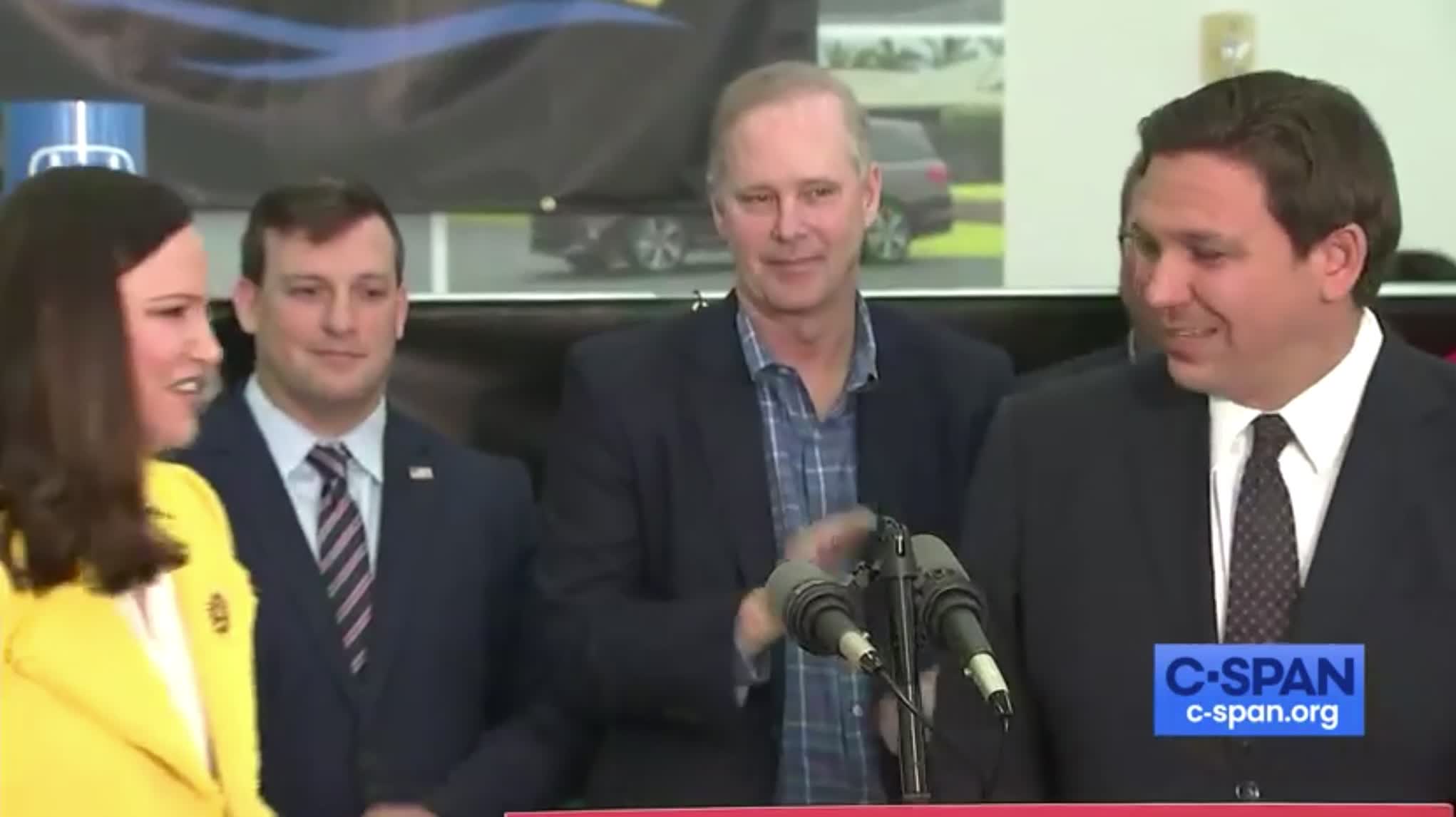 The audience chants "Let's go Brandon!" as Gov. DeSantis prepares to ...