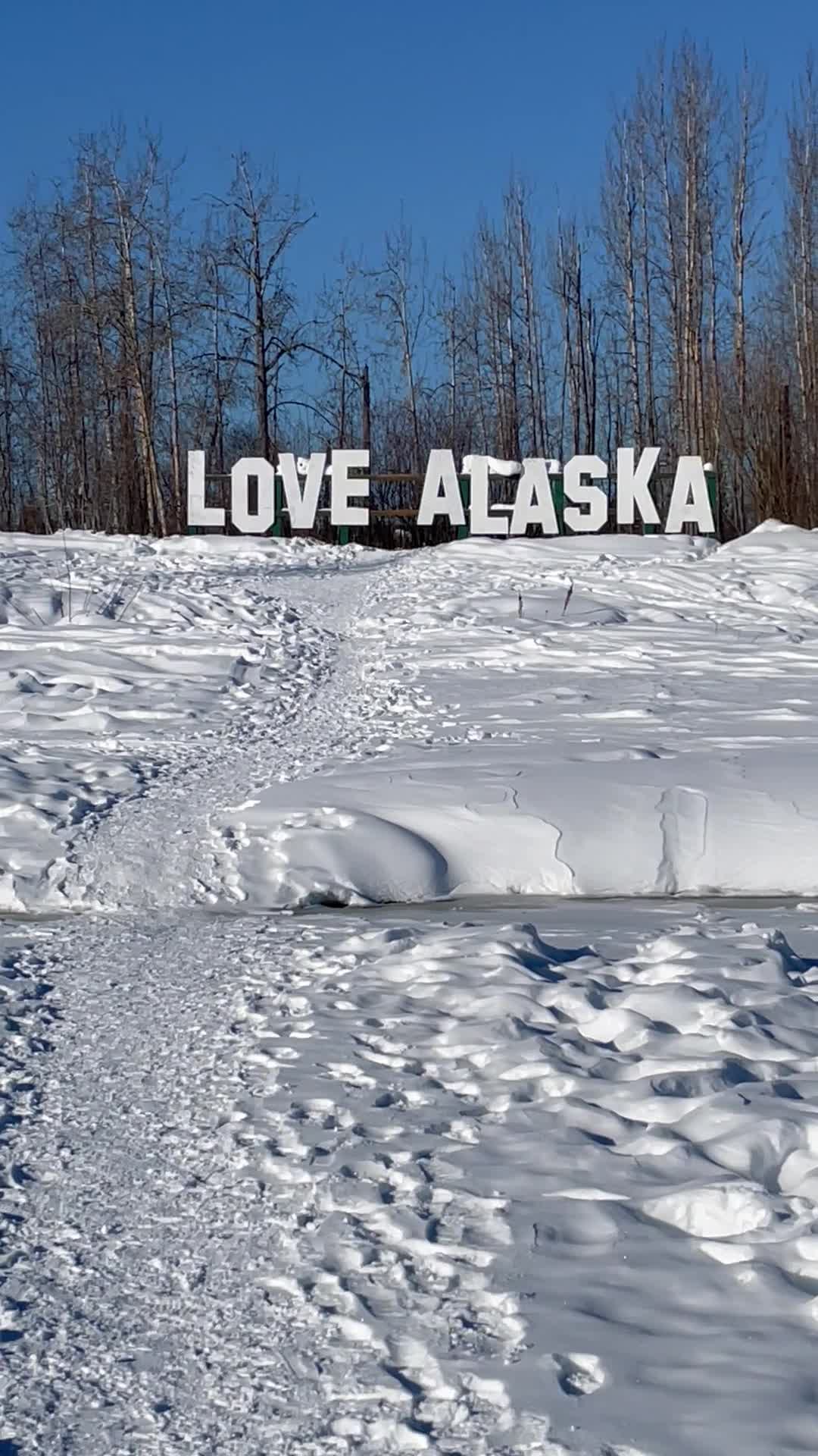 "LOVE ALASKA" Sign along with Chena River in Fairbanks, Alaska in April