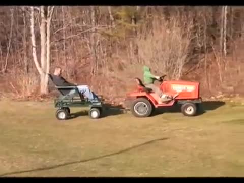 MM #1 - 2009 Daniel giving tractor rides with Grammy's new Kubota G6200H