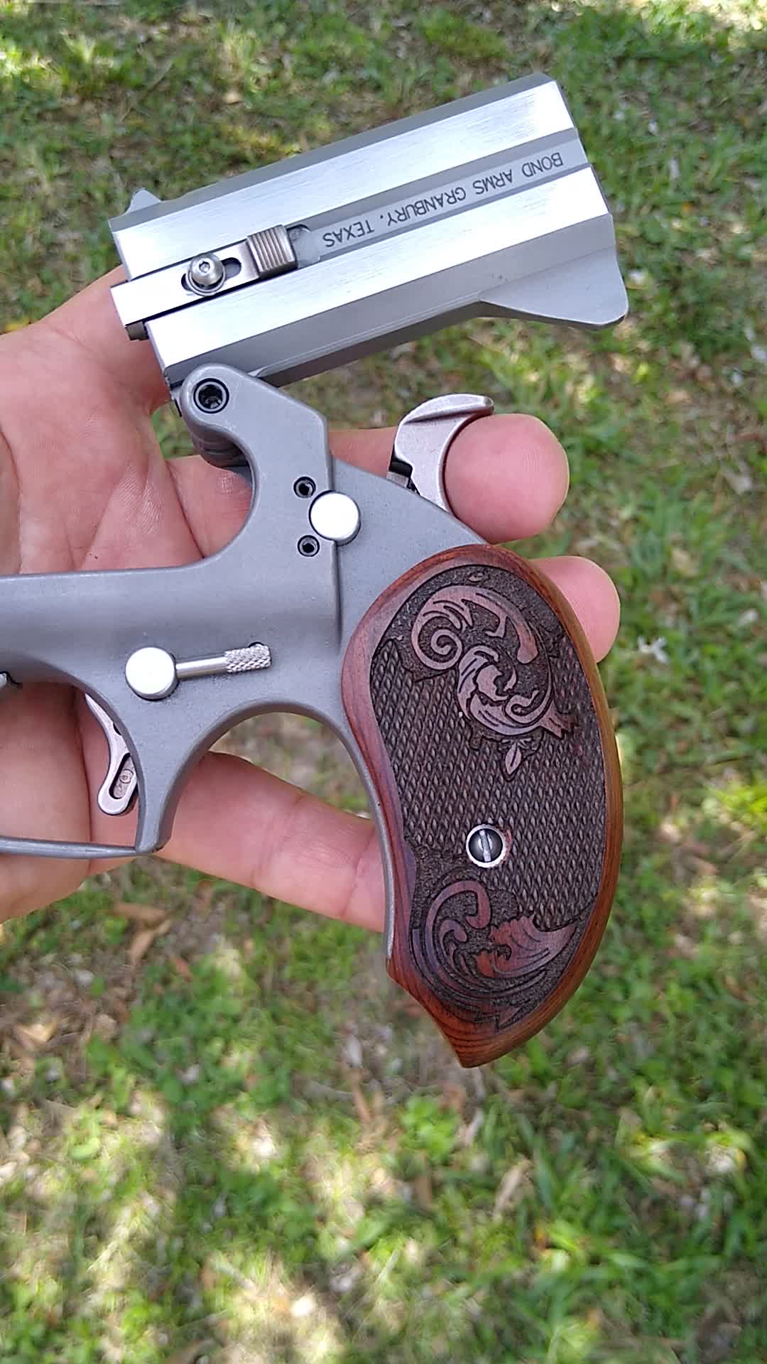 Bond Arms Derringer (with custom grips)