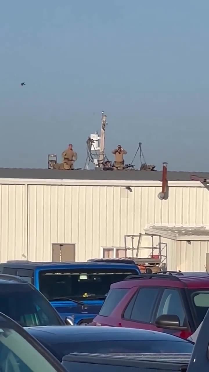 Snipers take position on buildings with sloped roofs for the Trump ...