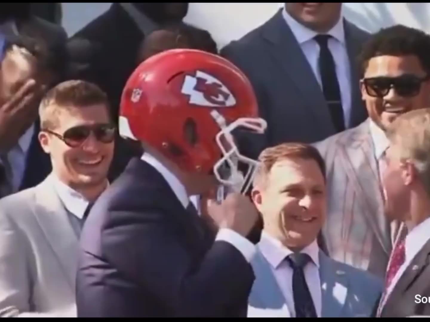 Biden Bizarrely Puts On Chiefs Helmet, Mirrors Michael Dukakis Moment