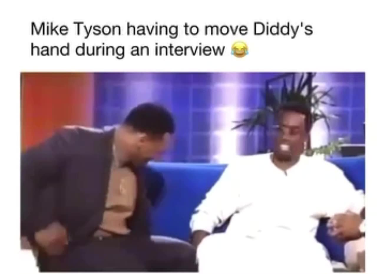 Mike Tyson Moving Diddy’s Hand During An Interview